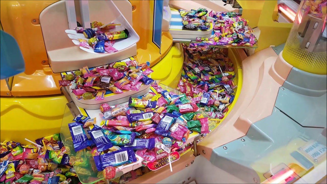 CANDY PUSHER CLAW MACHINE HUGE JACKPOT - YouTube
