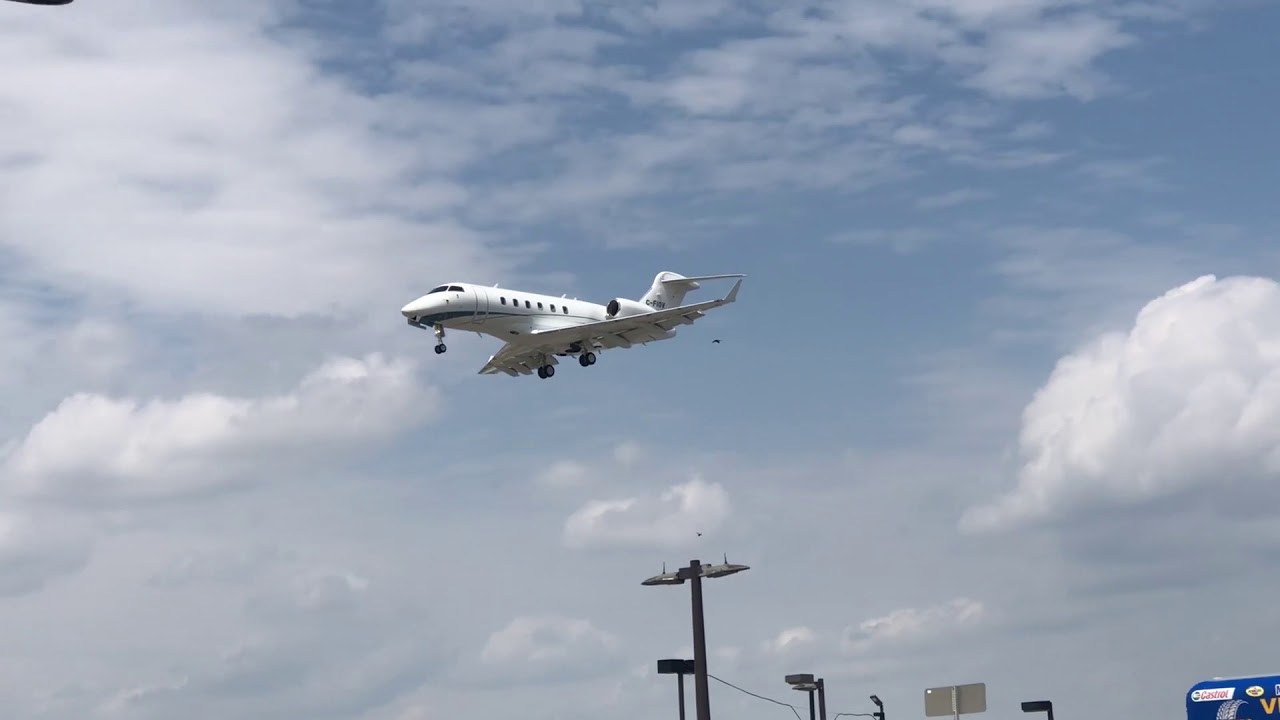 Private Bombardier Challenger 300 C-FIOV Landing Toronto on RWY 23 ...