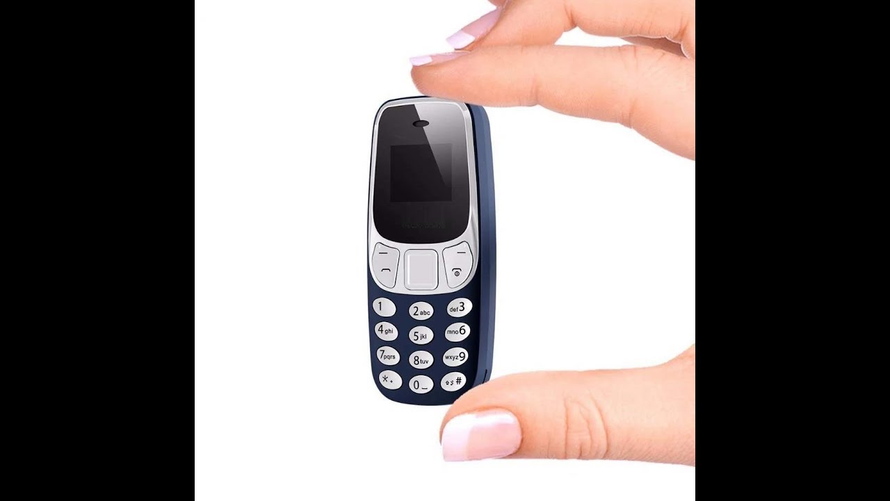 Kaizen Enterprises Vaku World's Smallest Dual-Sim Nano Phone - YouTube