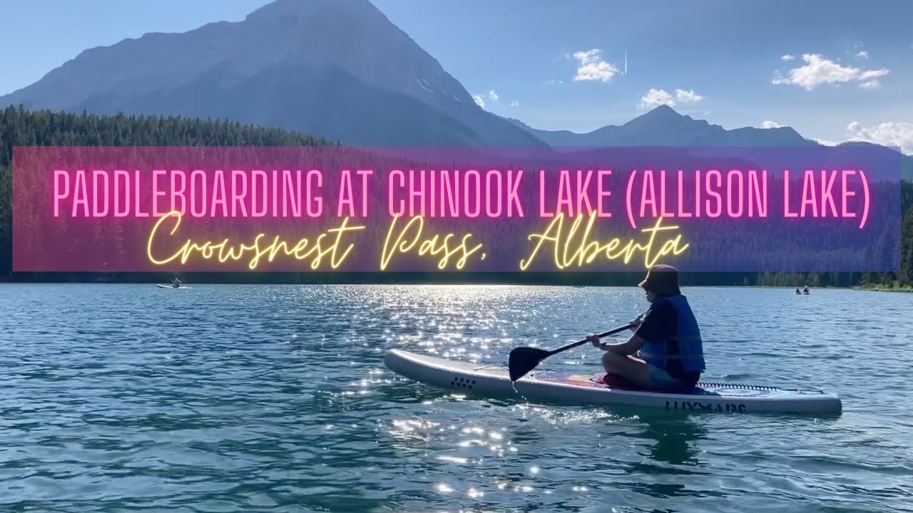PADDLEBOARDING AT CHINOOK LAKE (ALLISON LAKE), CROWSNEST PASS, ALBERTA ...