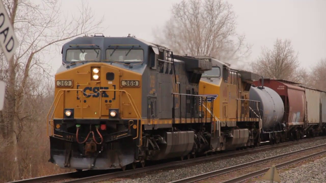 Union Pacific unit trailing a CSX CW44 locomotive on a general manifest ...
