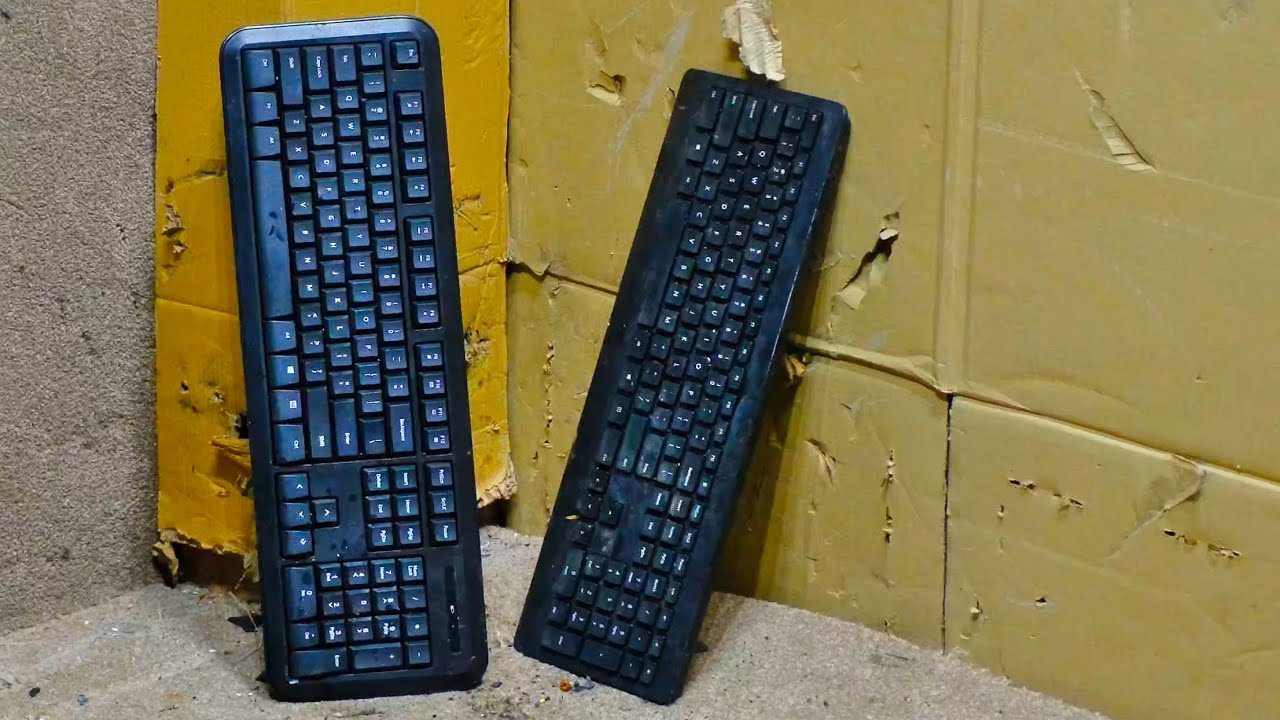 Smash Two Wireless Computer Keyboards - YouTube