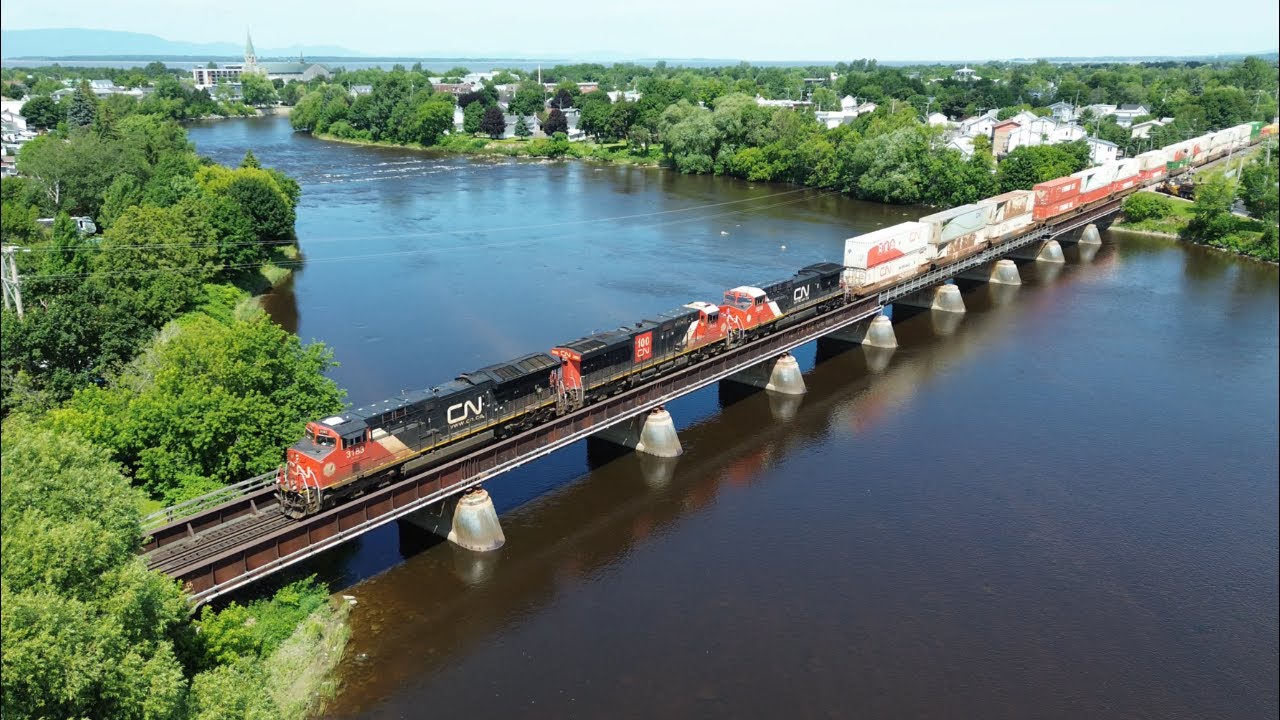 Awesome Aerial 4K Video! Long Stack Train CN 121 Crossing Bridge at ...