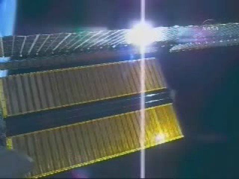 ISS Solar Array Tears During Redeployment - YouTube