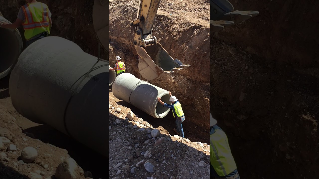 Installing Concrete Reinforced Pipe - YouTube