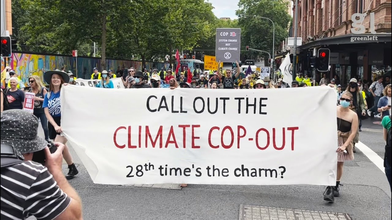 Climate activists call out 'greenwashing' at COP28 - YouTube