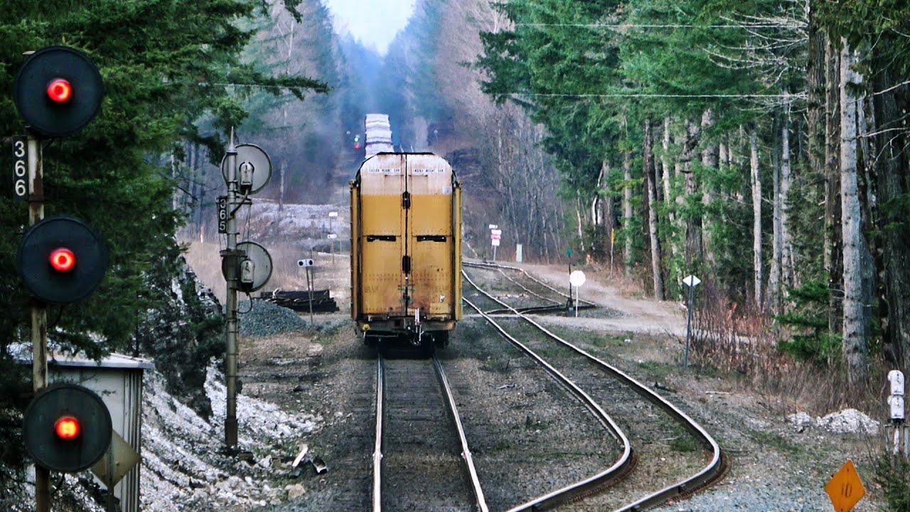 Trains Back To Back With Railroad Signals Over A Steep Hill Climb On ...
