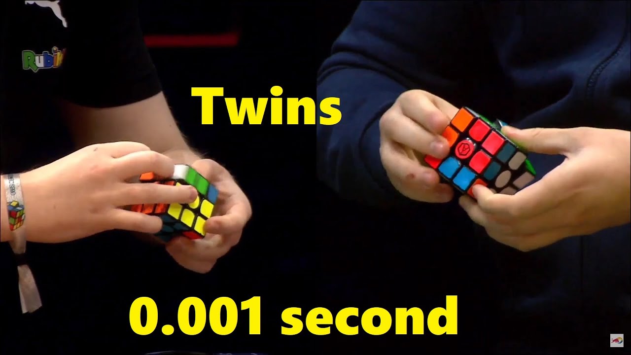 Twins solve Rubik's cube with 0.001 sec difference - YouTube