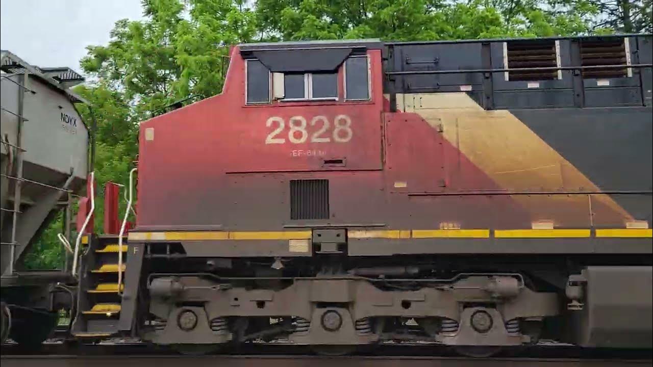 CN 3841, 2828 Eastbound train with new CN hoppers, DWC/BRITISH COLUMBIA bulkhead flat car - YouTube