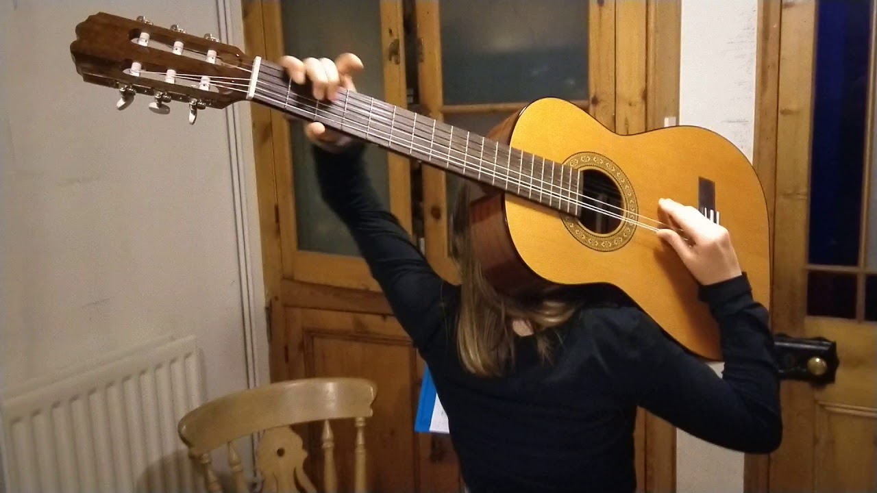 Playing guitar behind head and backwards - YouTube