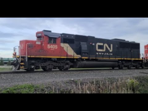 CN 5405 and 5304 Come Home Into The Gladstone Yard - YouTube