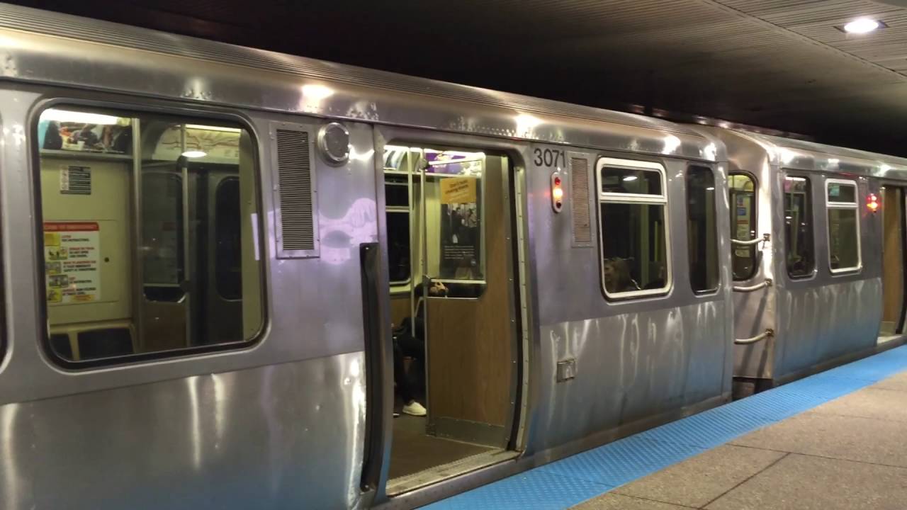 CTA Blueline train stops at Rosemont station and departed to O'Hare ...