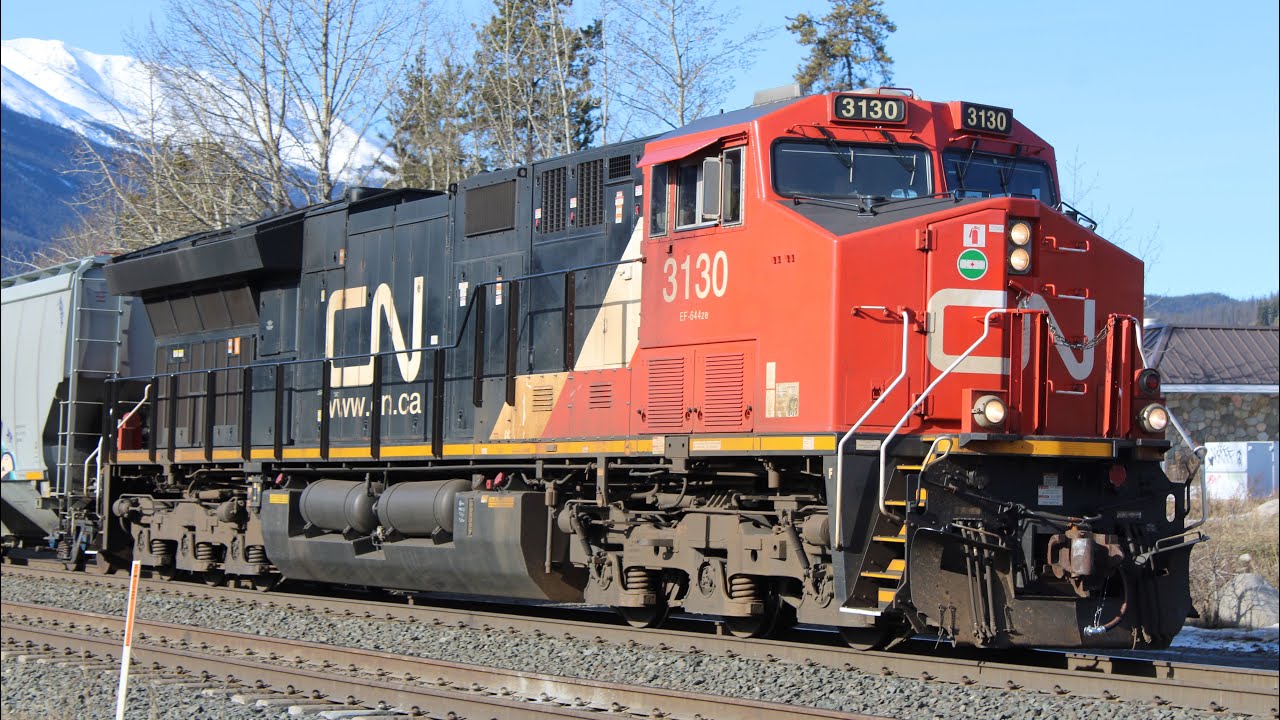 CN 3130 leads CN G834 Grain train approaching Jasper Alberta off the Albreda Subdivision. - YouTube