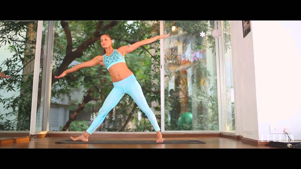 Yoga for toned legs // ELLE Active - YouTube