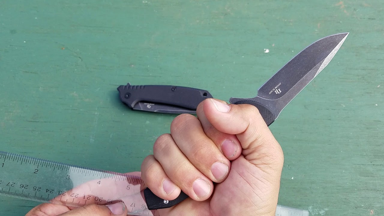 Two new Doom Blade knives. One is really nice and one is just ok ...