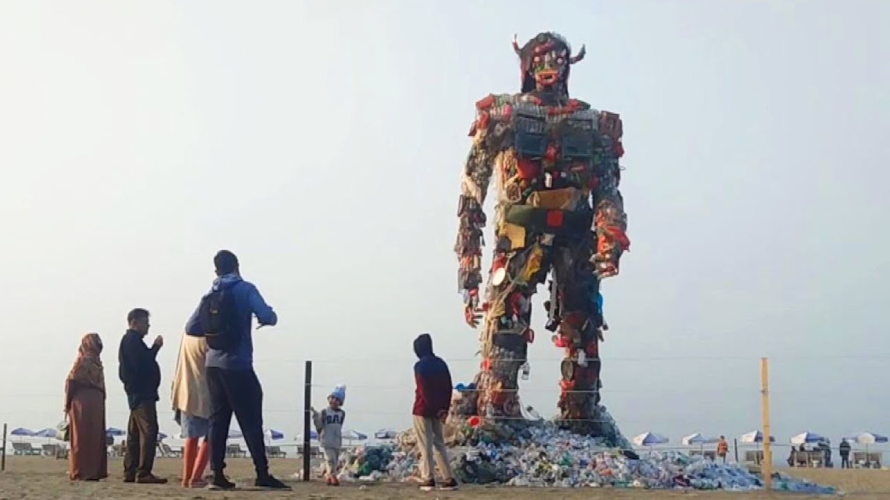 Giant Plastic Garbage Monster Looms Over Beach - YouTube