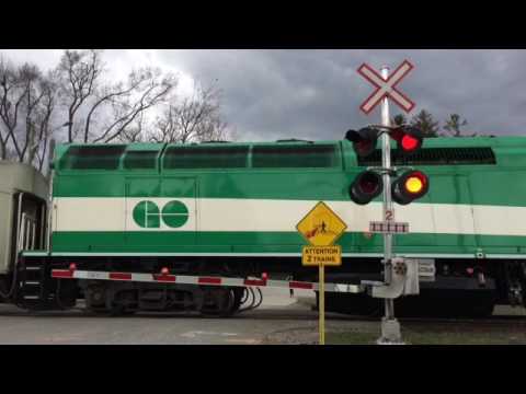 2 trains go by Railroad Crossing - YouTube