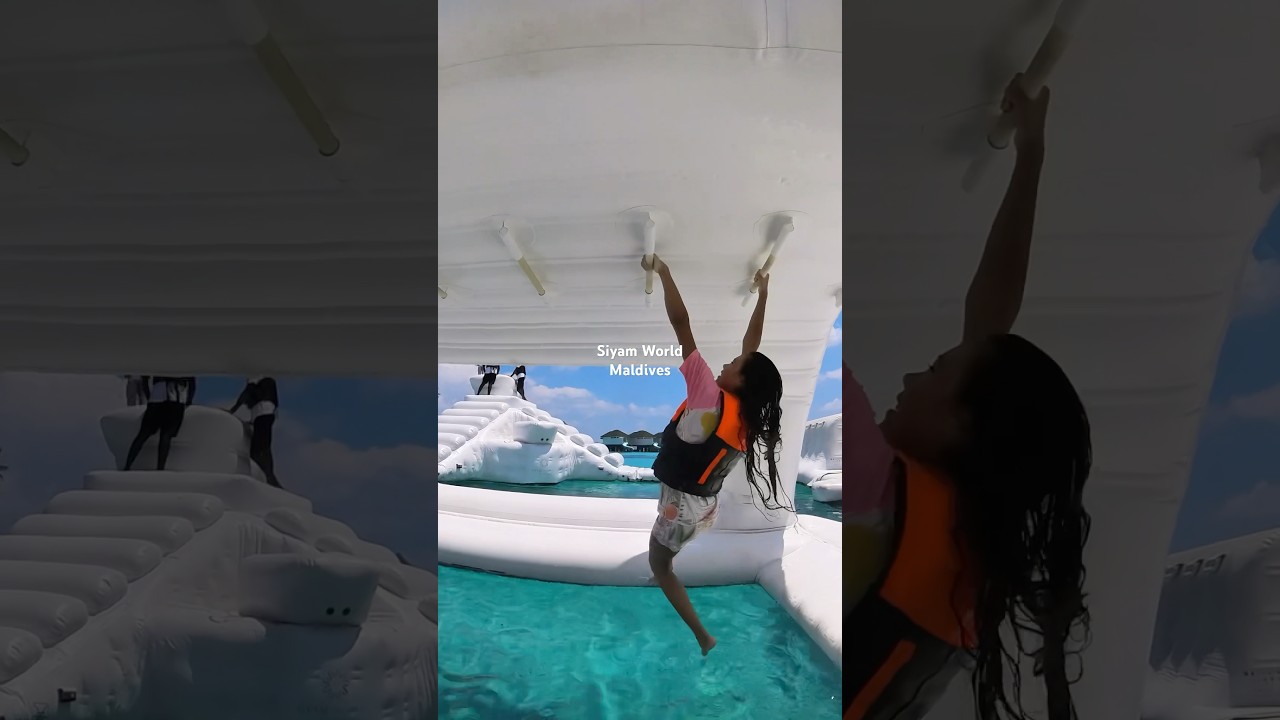 Playing on the inflatable waterpark in Siyam World Maldives - YouTube