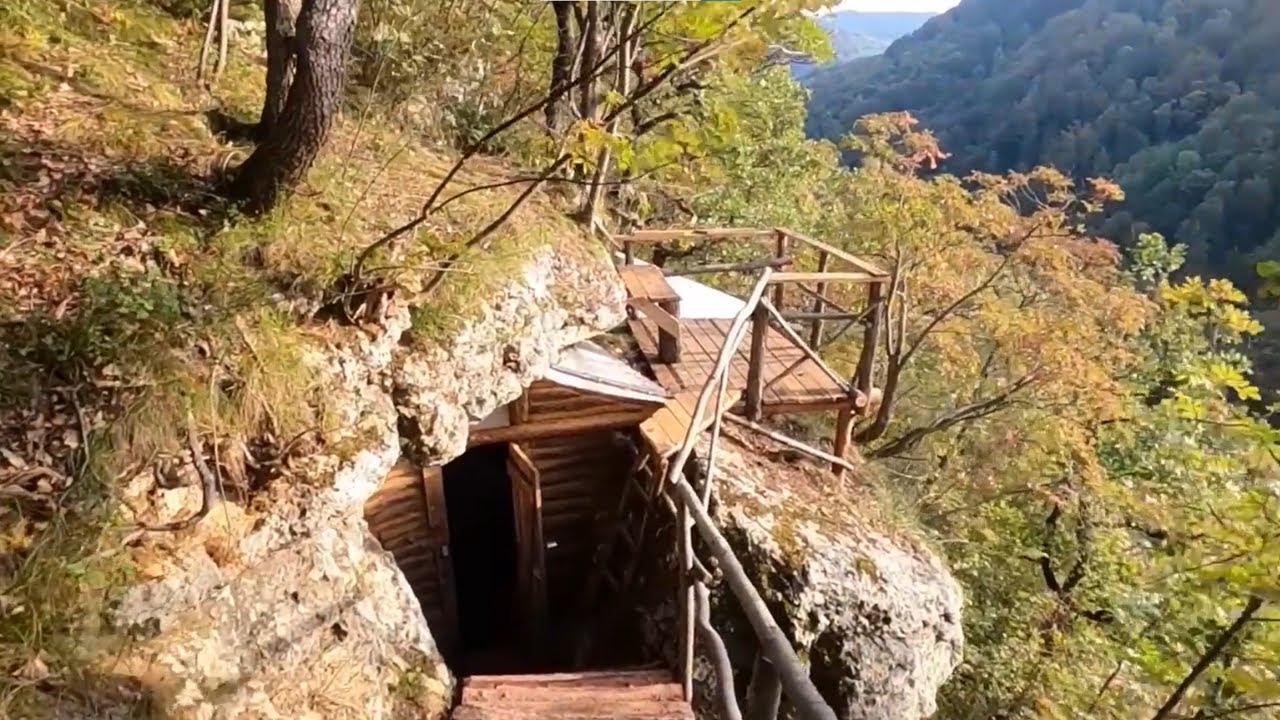 Building a cliff shelter - Forest exploration and outdoor adventures ...