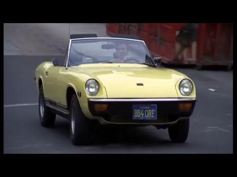 '73 Jensen-Healey chases '66 Ford Fairlane 500 - YouTube