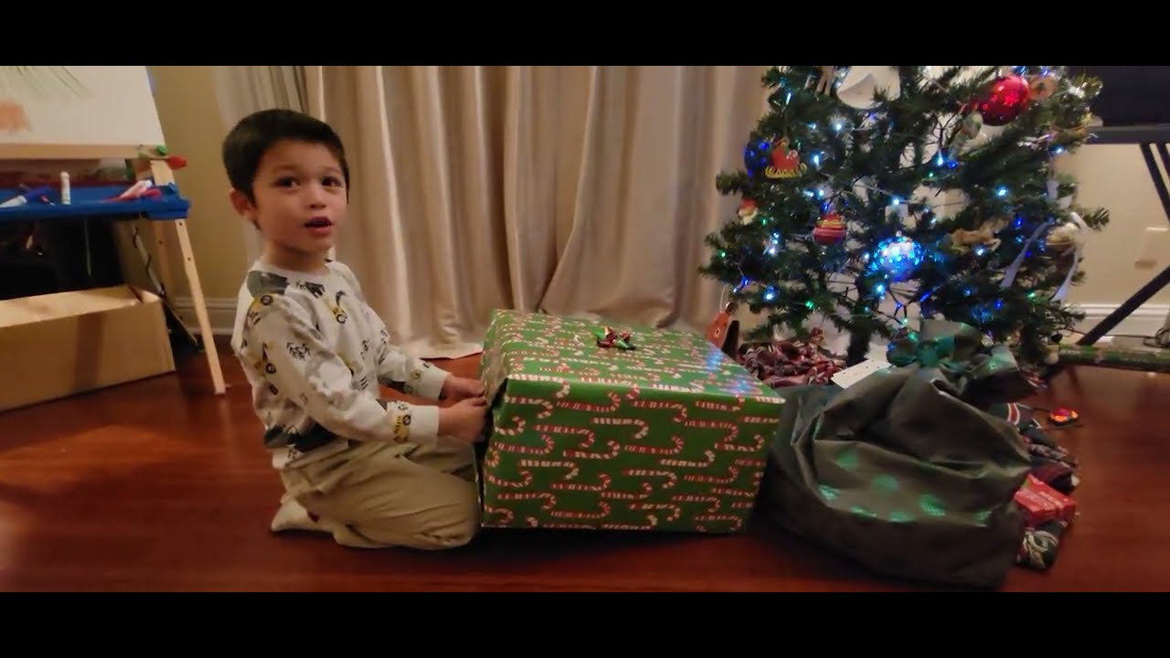 How to rip open wrapping paper. What's in the box? Opening a Christmas ...