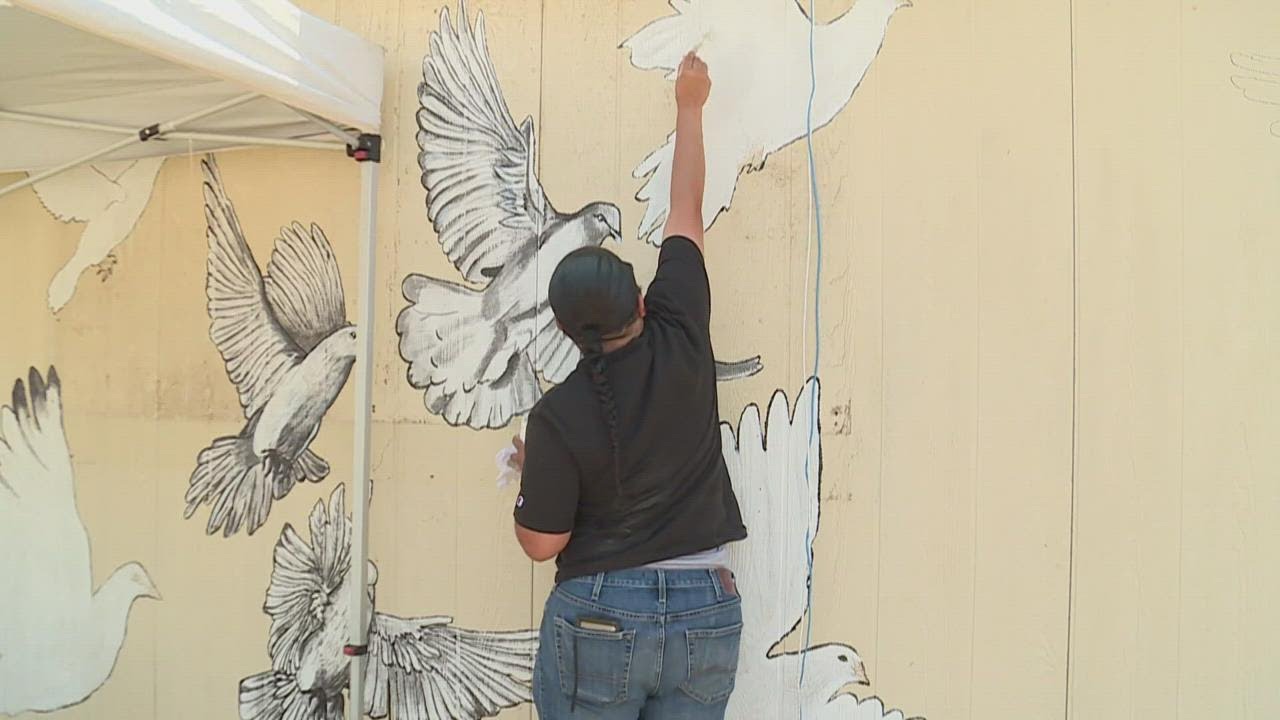 Child helps paint mural honoring the victims of the Uvalde shooting ...