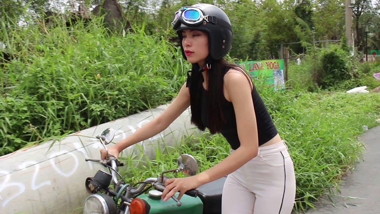 top model pushing old moped - YouTube