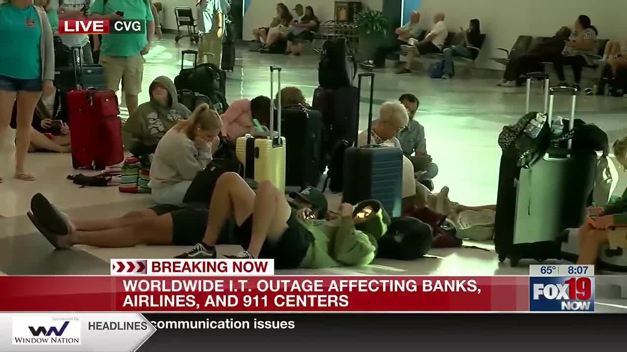 Flights grounded at CVG due to worldwide I.T. outage - YouTube