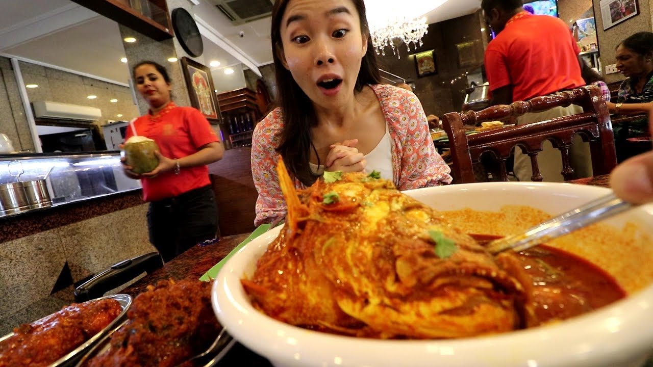 Japanese girl eats "Fish Head Curry" with her hand in Singapore (first ...