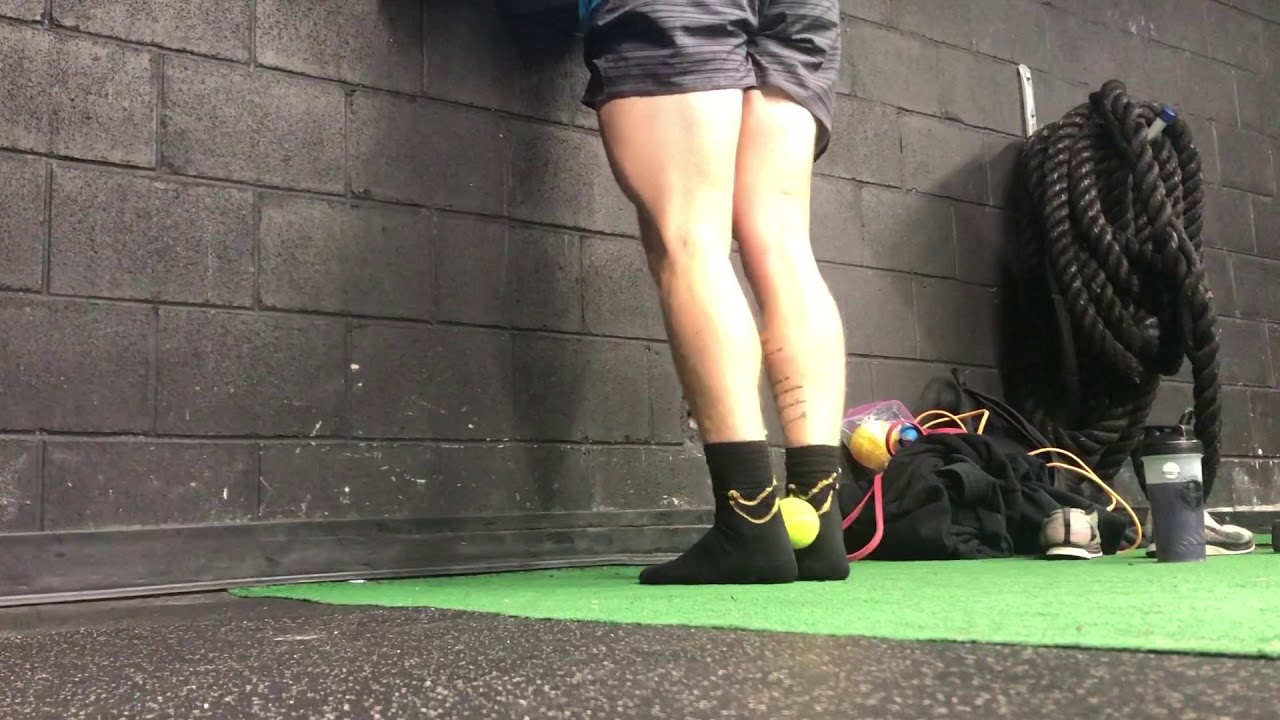 Tennis ball posterior tibialis calf raise - YouTube