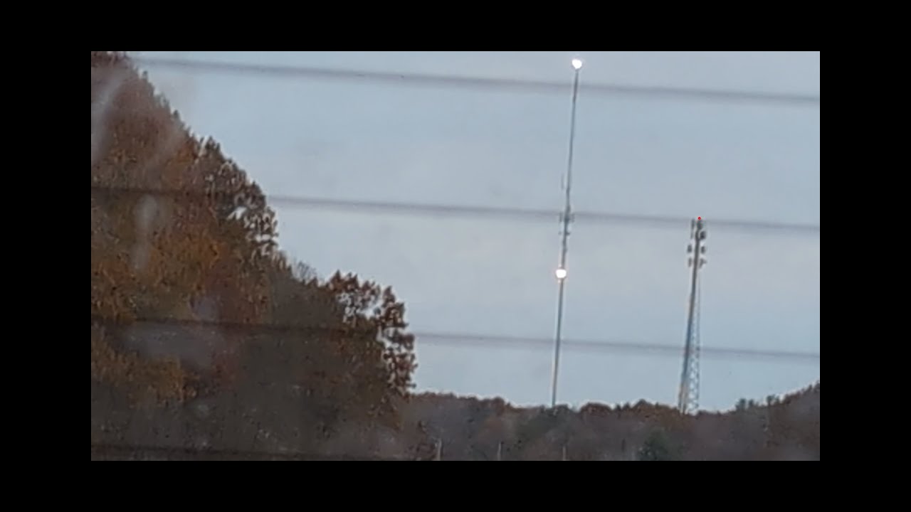 A tower with an FH-324 on night mode and another tower with 2 tiers of ...