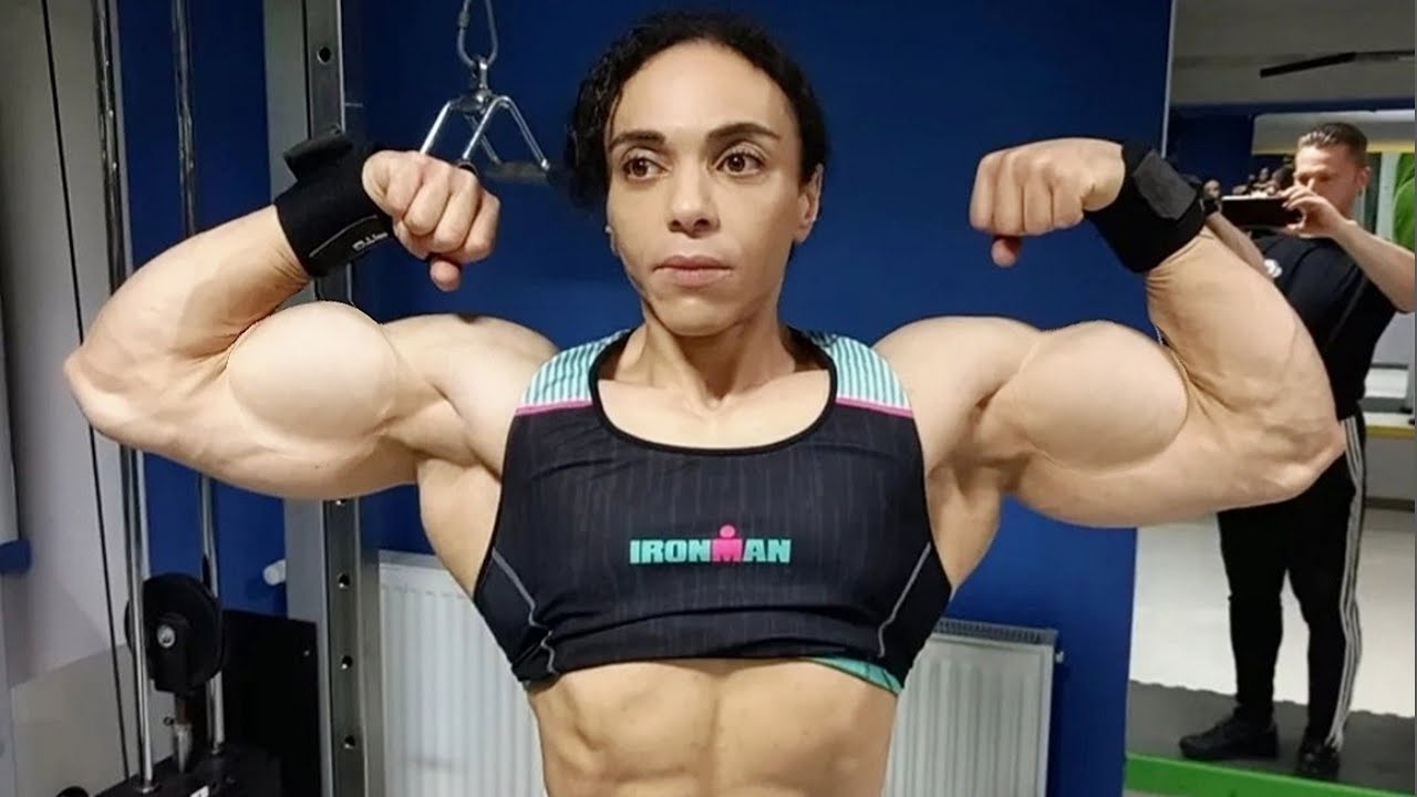 Big Biceps Manal Ben woman bodybuilder - Tall woman flexing - YouTube