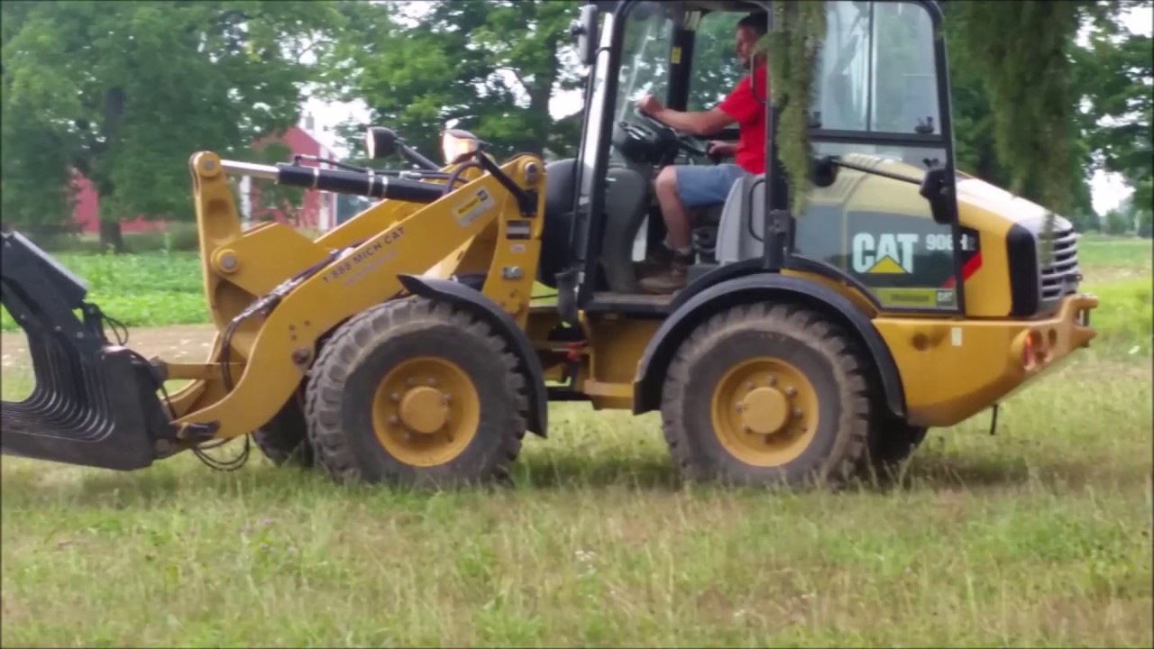 Cat 906H2 Wheel Loader with Grapple & Valby Crane - YouTube