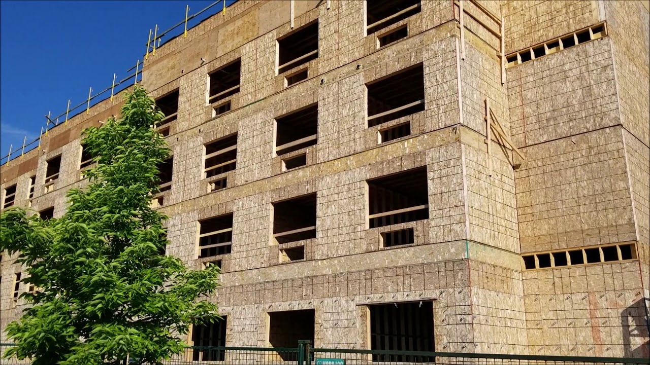 unsafe fire trap 4 story residential building made out of wood - YouTube