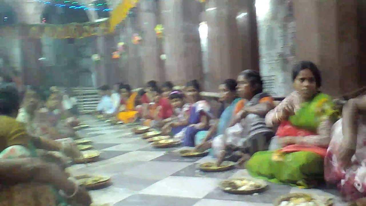 Prasad distribution in the temple - YouTube