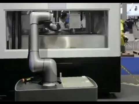 Collaborative robot loading unloading - YouTube