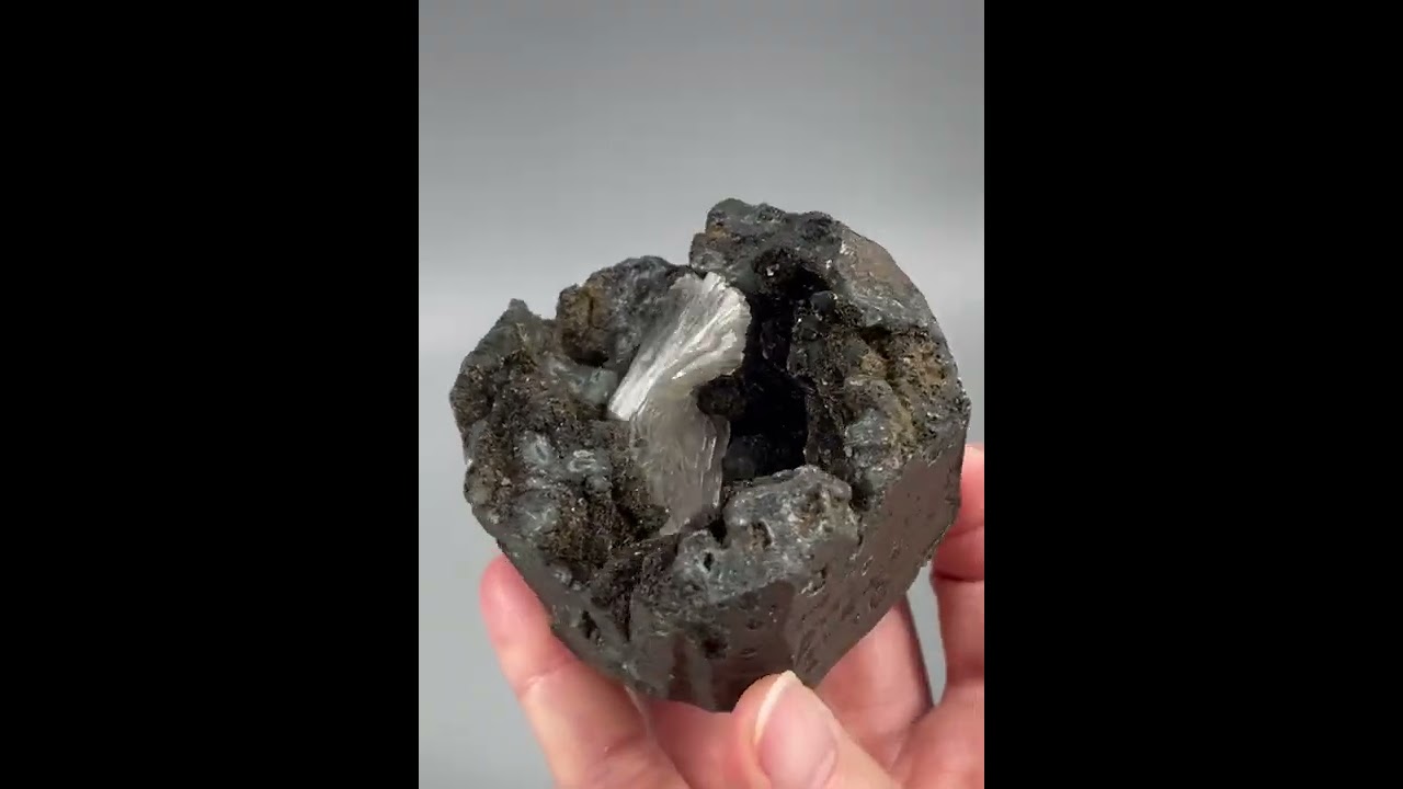 Clear Heulandite in a Trimmed Basalt Pocket - YouTube
