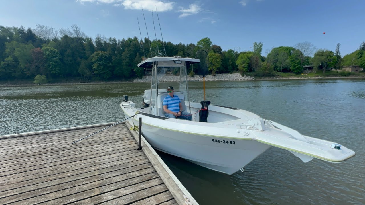 Taking black lab dog out on center console boat fishing for the first ...