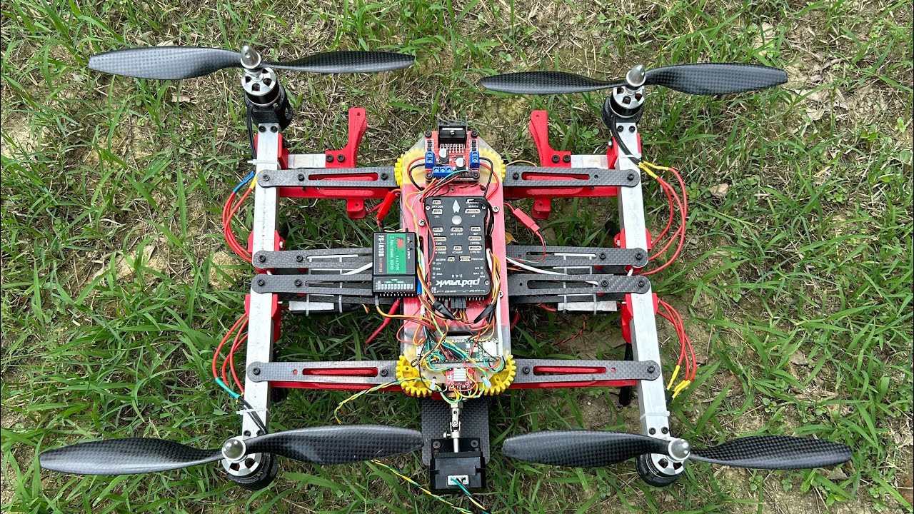 Shape morphing quadcopter drone with robotic gripper - YouTube