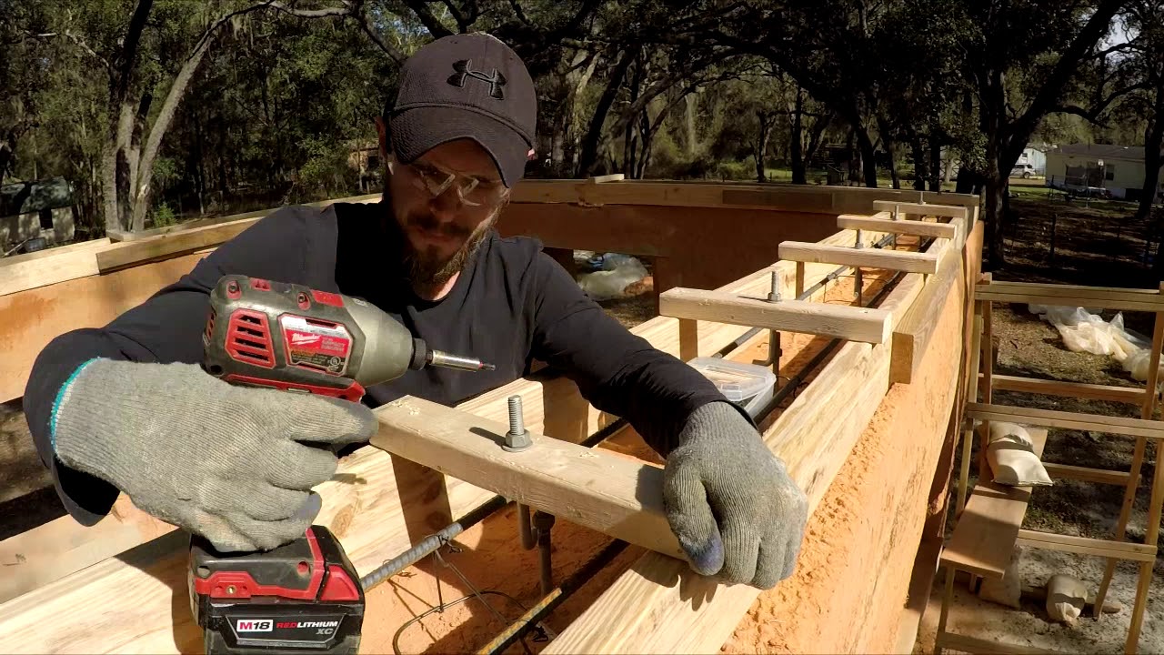 Cob House Bond Beam Preparation - Roofing Attachment Point - YouTube