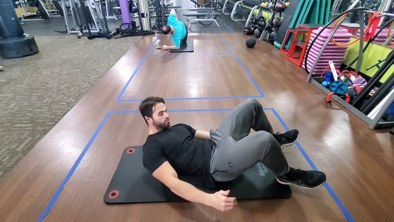 Laying Alternating Side Crunches Form - YouTube