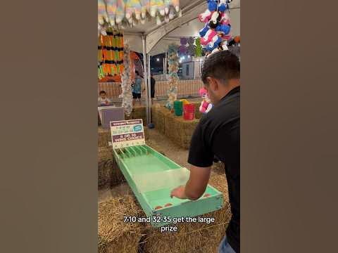 This Carnival Game is impossible to win #carnivalgames #midwaygames #rigged #shorts - YouTube