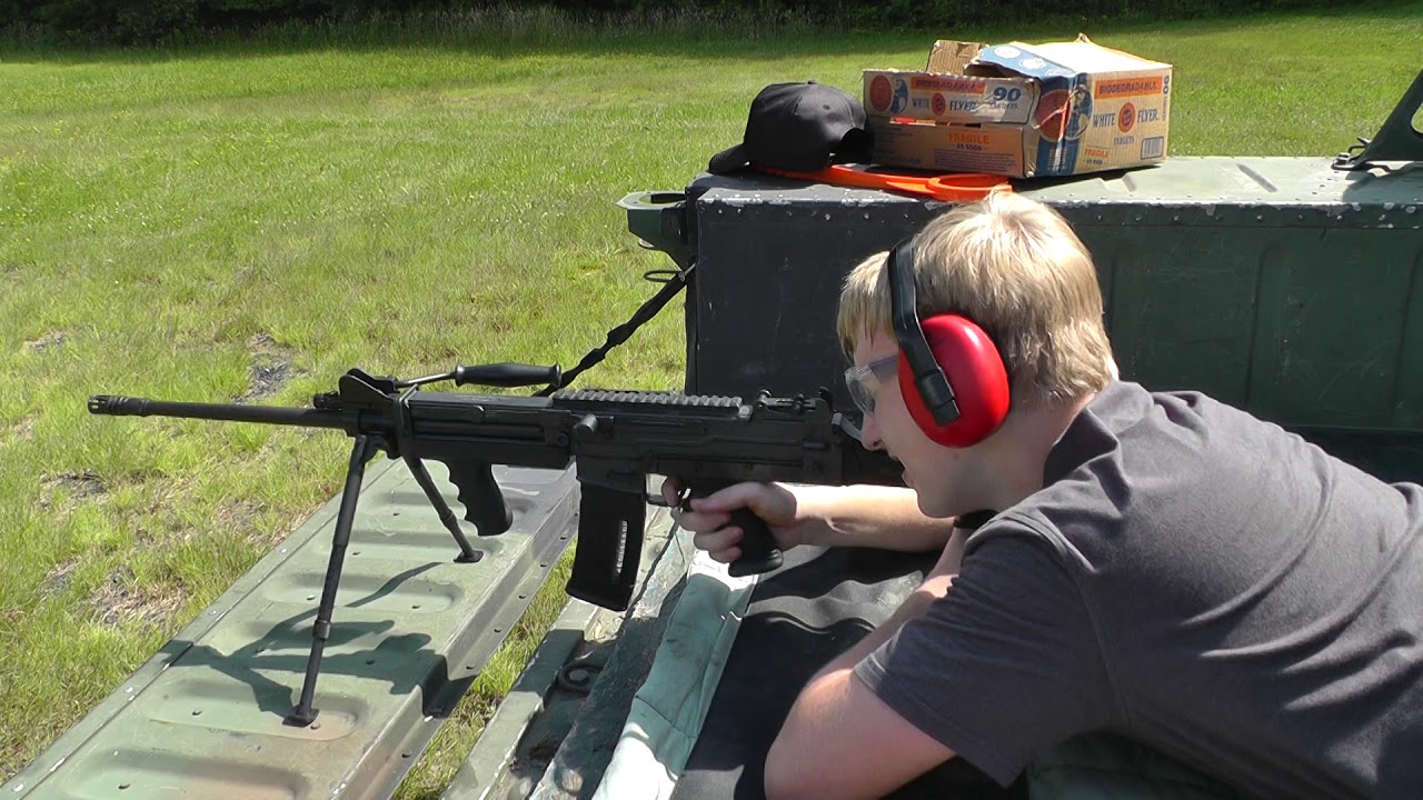 Ultimax 2000 out of the back of a m998 - YouTube