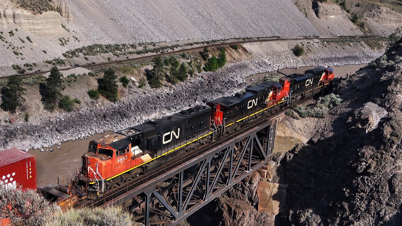 Double Stack CN & CPKC Trains Curving Between The Beautiful Thompson ...