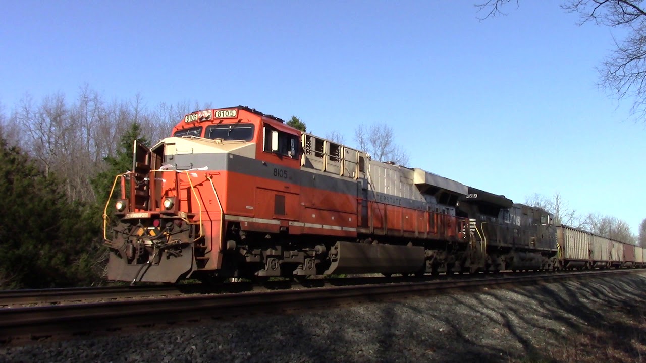 NS loaded coal train #578 with Interstate heritage unit #8105 leading ...
