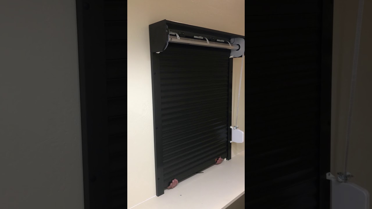 Roll-A-Shield anti lifts for manual shutters - YouTube