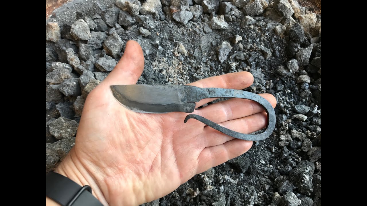 Forging a knife on a viking style anvil - YouTube