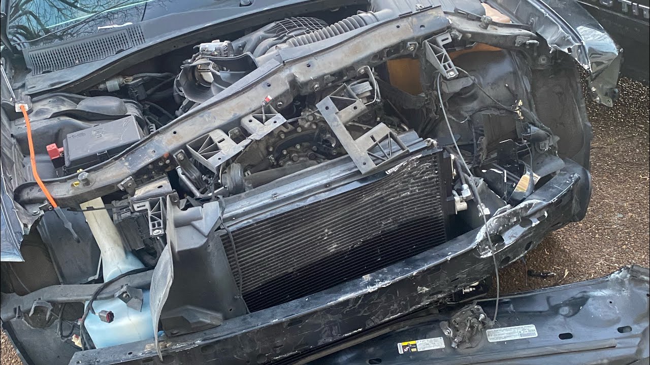 I removed my 2014 Dodge Charger upper radiator support bar 🔧🪛 Girl ...