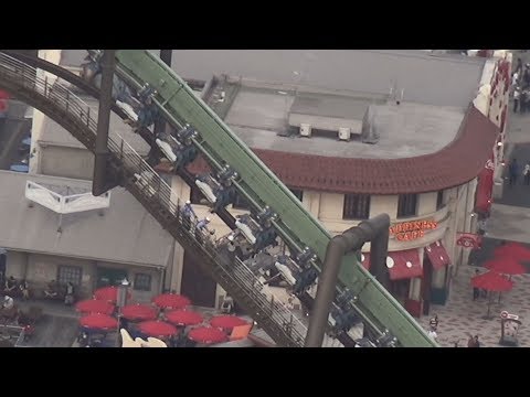 Universal Studios Japan Roller Coaster Stalls & Traps People Midair ...