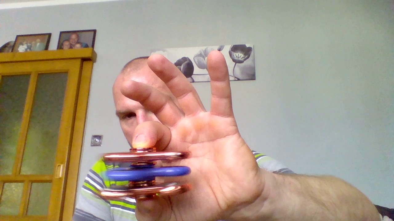 Longest Time Spinning Three Fidget Spinners In One Hand - YouTube